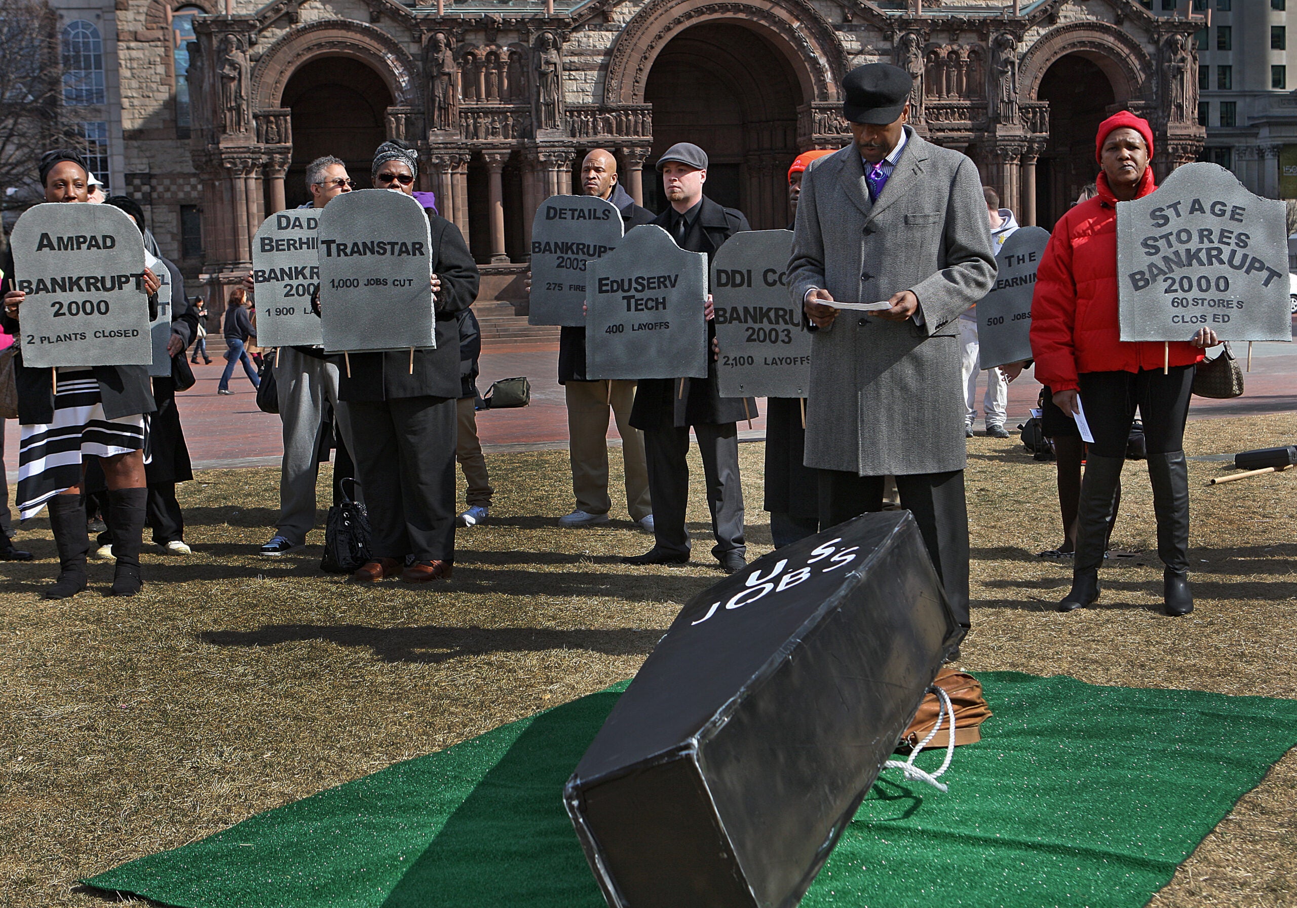 Protesters chide Romney, Bain Capital