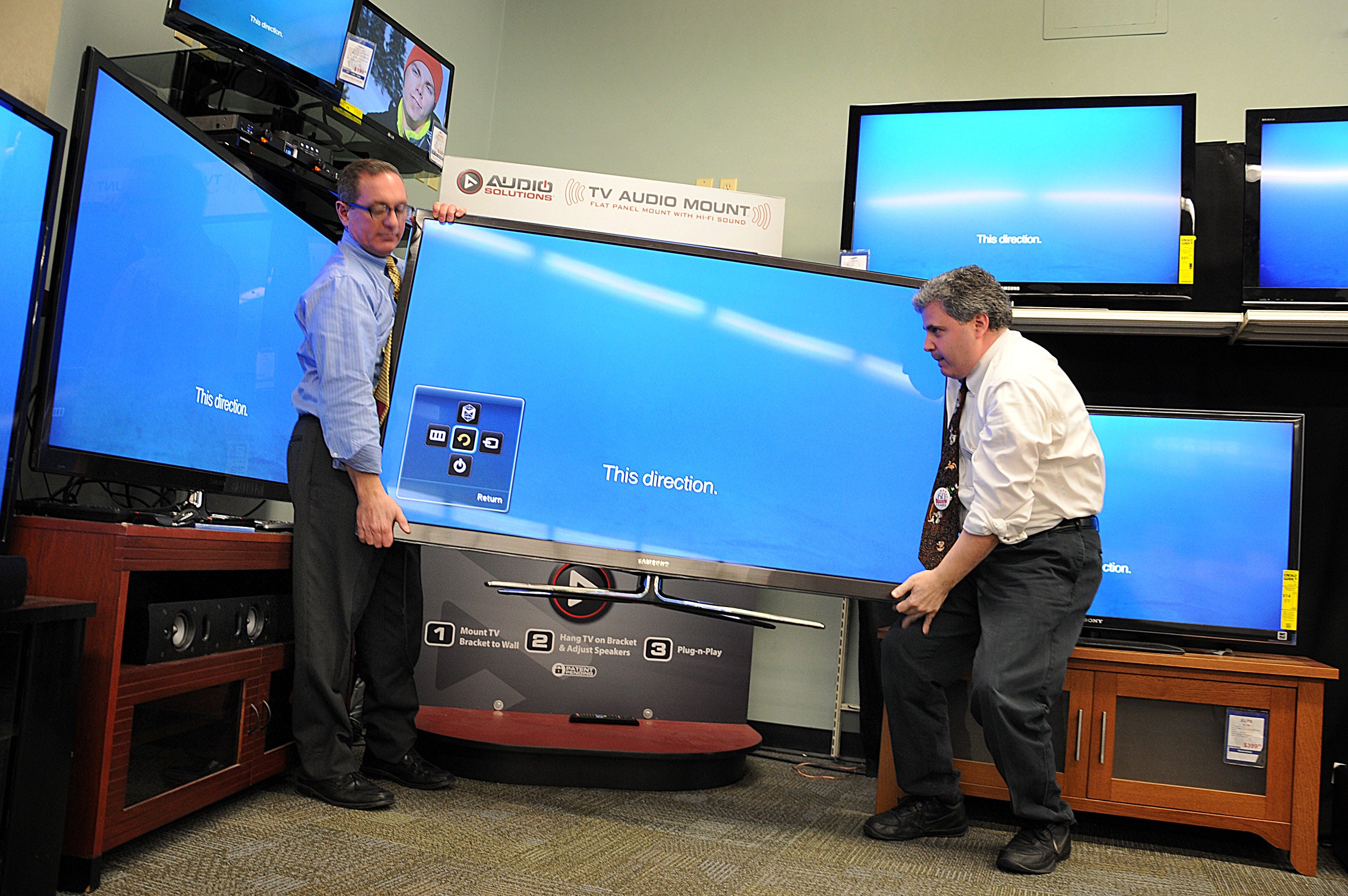 At home, huge-screen televisions can be a tough sell