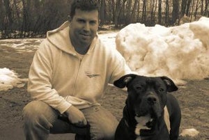Ludlow Selectman Aaron Saunders rescues a pit bull