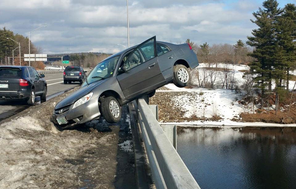 Here’s a Jaw-Dropping Photo of a Car Teetering From a Bridge