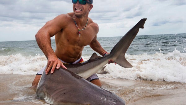 Meet the shark wrestler, whose job is exactly what it sounds like