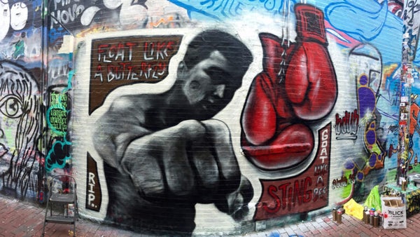 Artist honors Muhammad Ali with moving Central Square mural