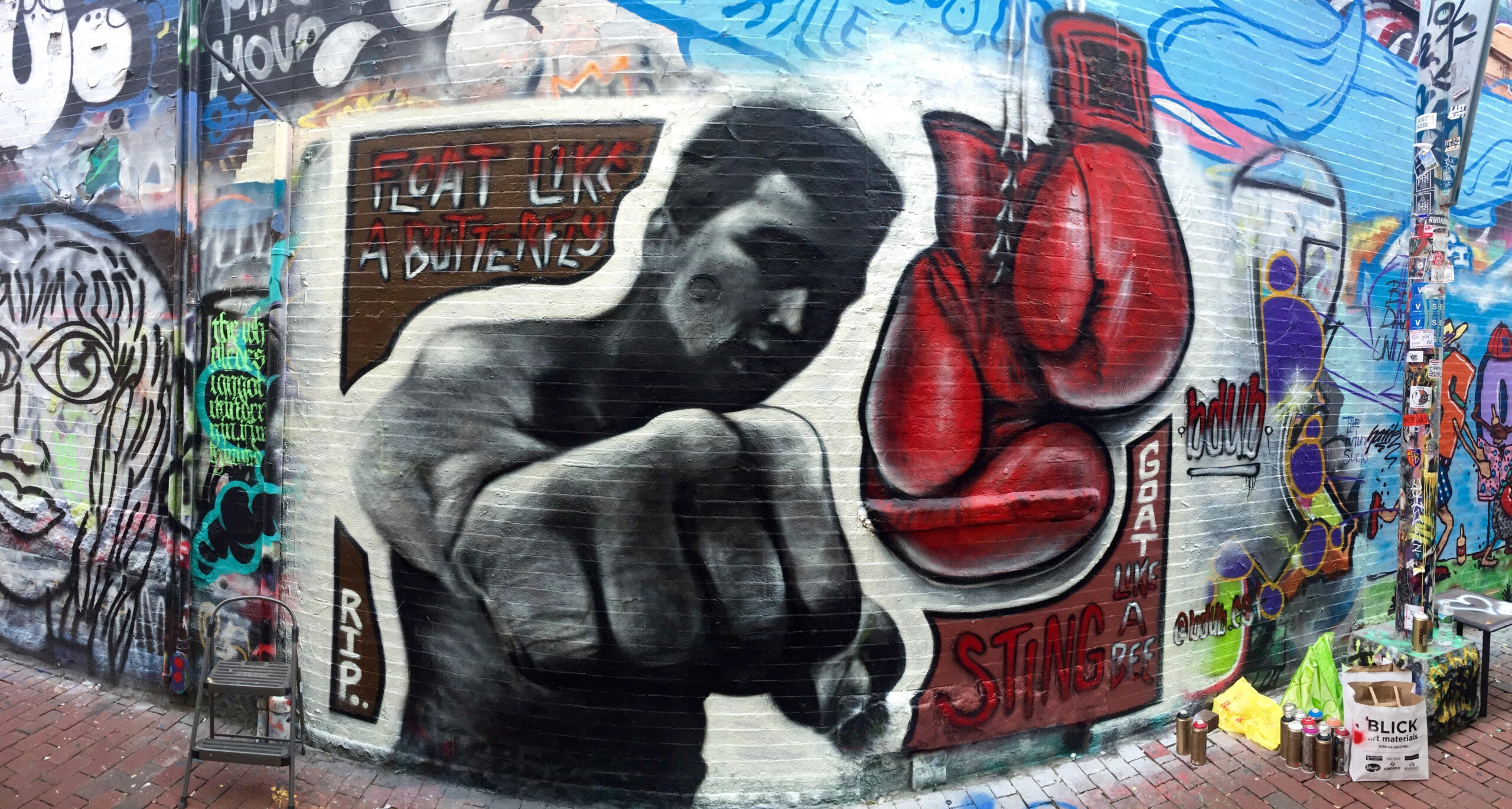 Artist honors Muhammad Ali with moving Central Square mural