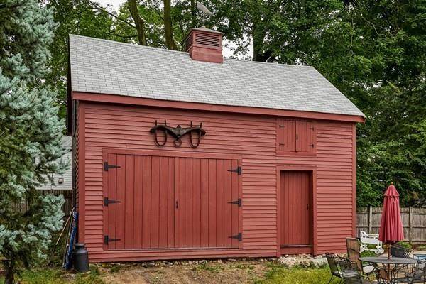 An 1820 Colonial farmhouse with a barn is for sale right in Boston