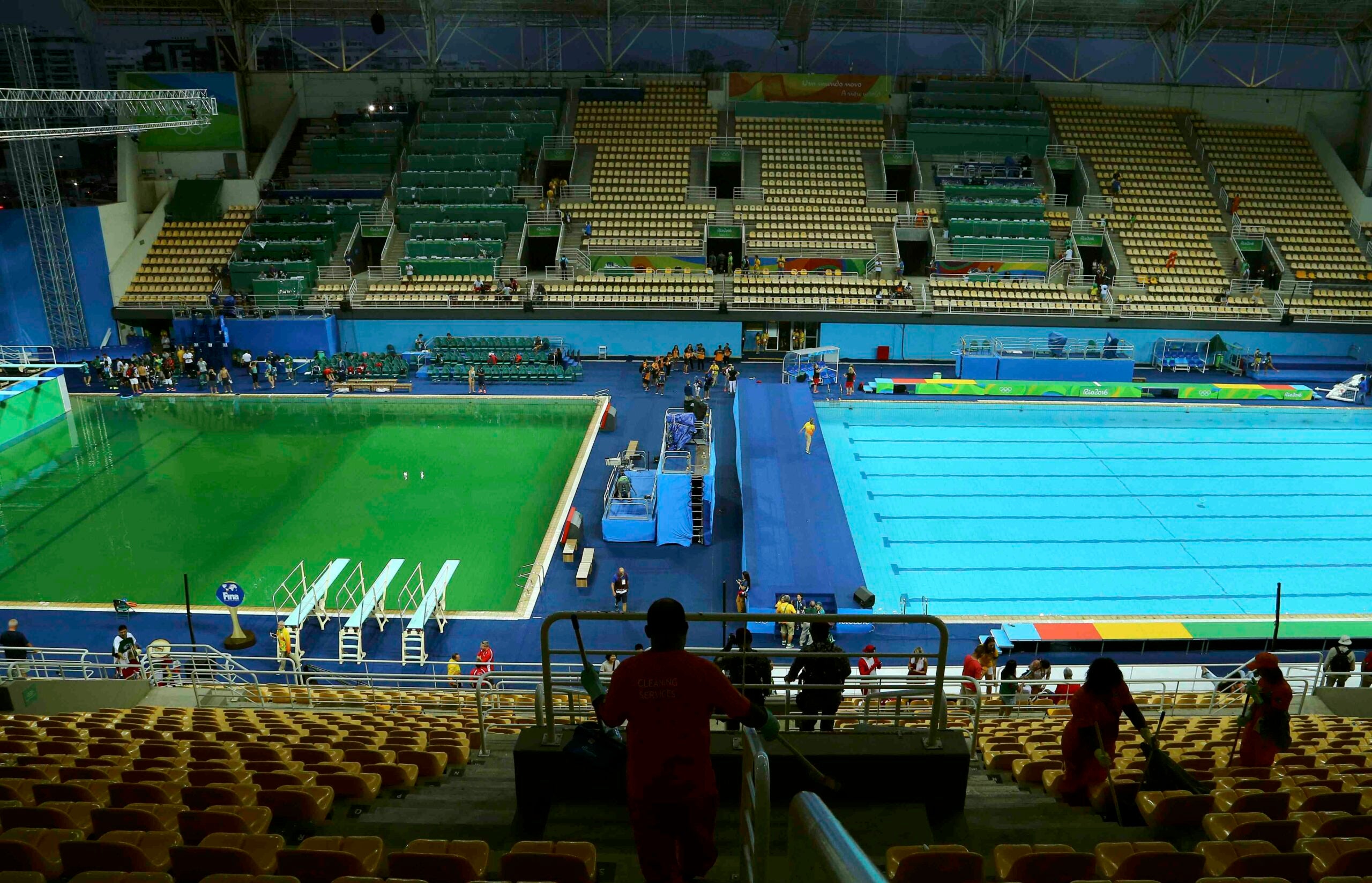 Green, not gold, color of the day at Olympic diving pool