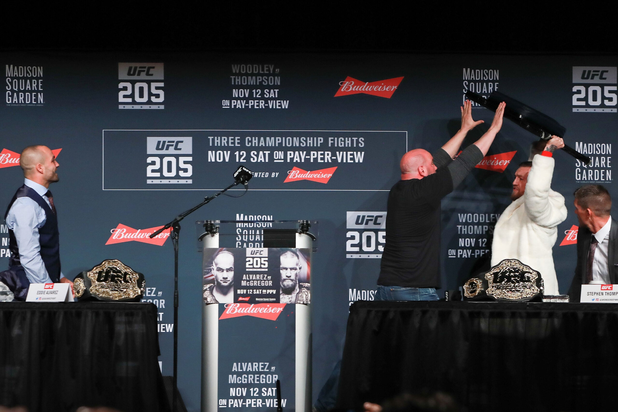 Conor McGregor raises a chair at UFC's New York press conference