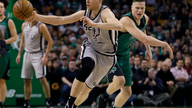 With big lift from rookie Bertans, Spurs top Boston 109-103