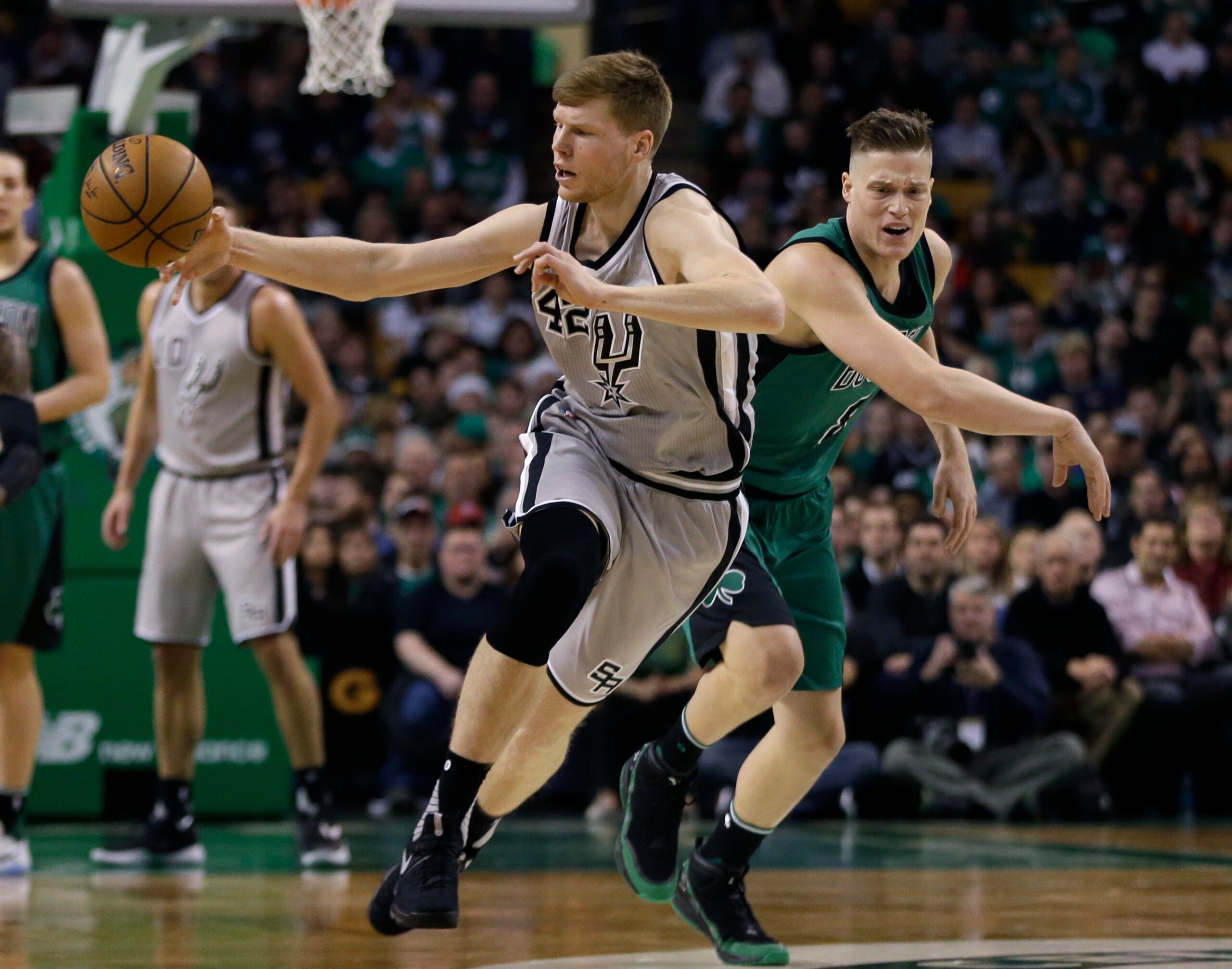 With big lift from rookie Bertans, Spurs top Boston 109-103