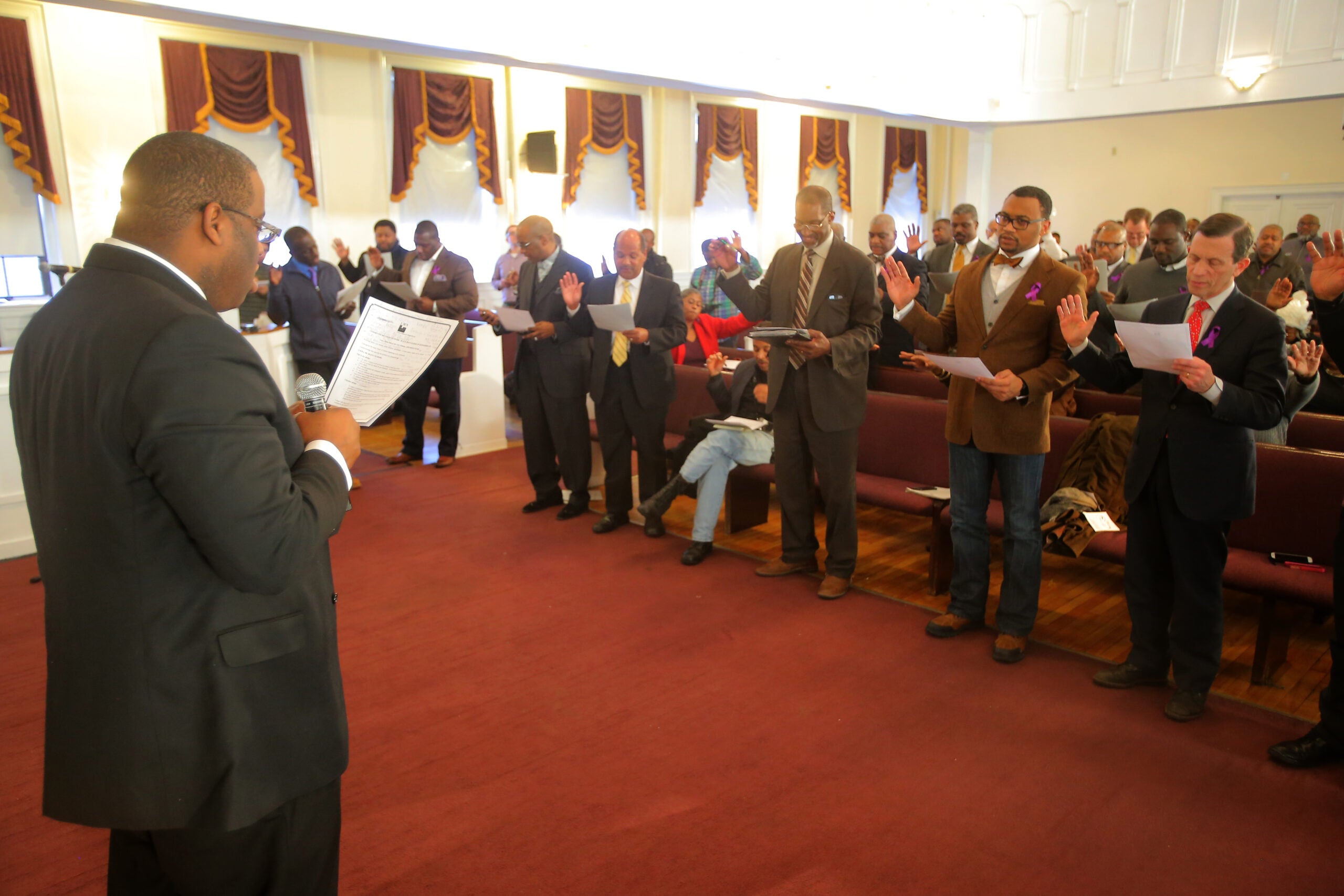 Black men in Boston take pledge to renounce violence, support community