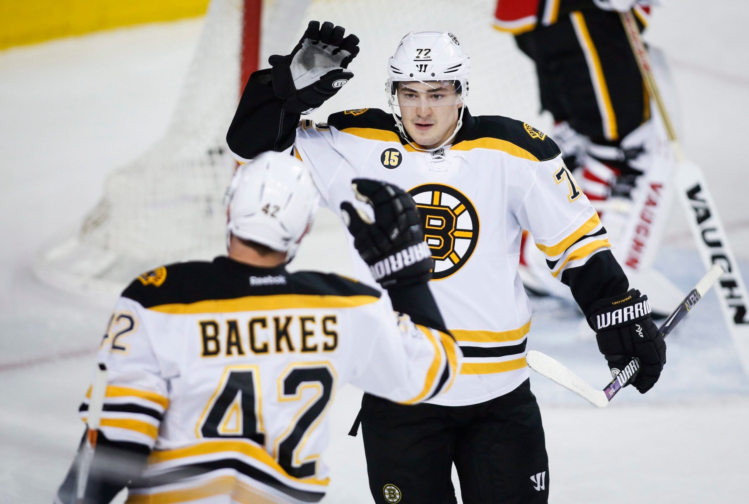 Bruins end Flames' 10-game winning streak