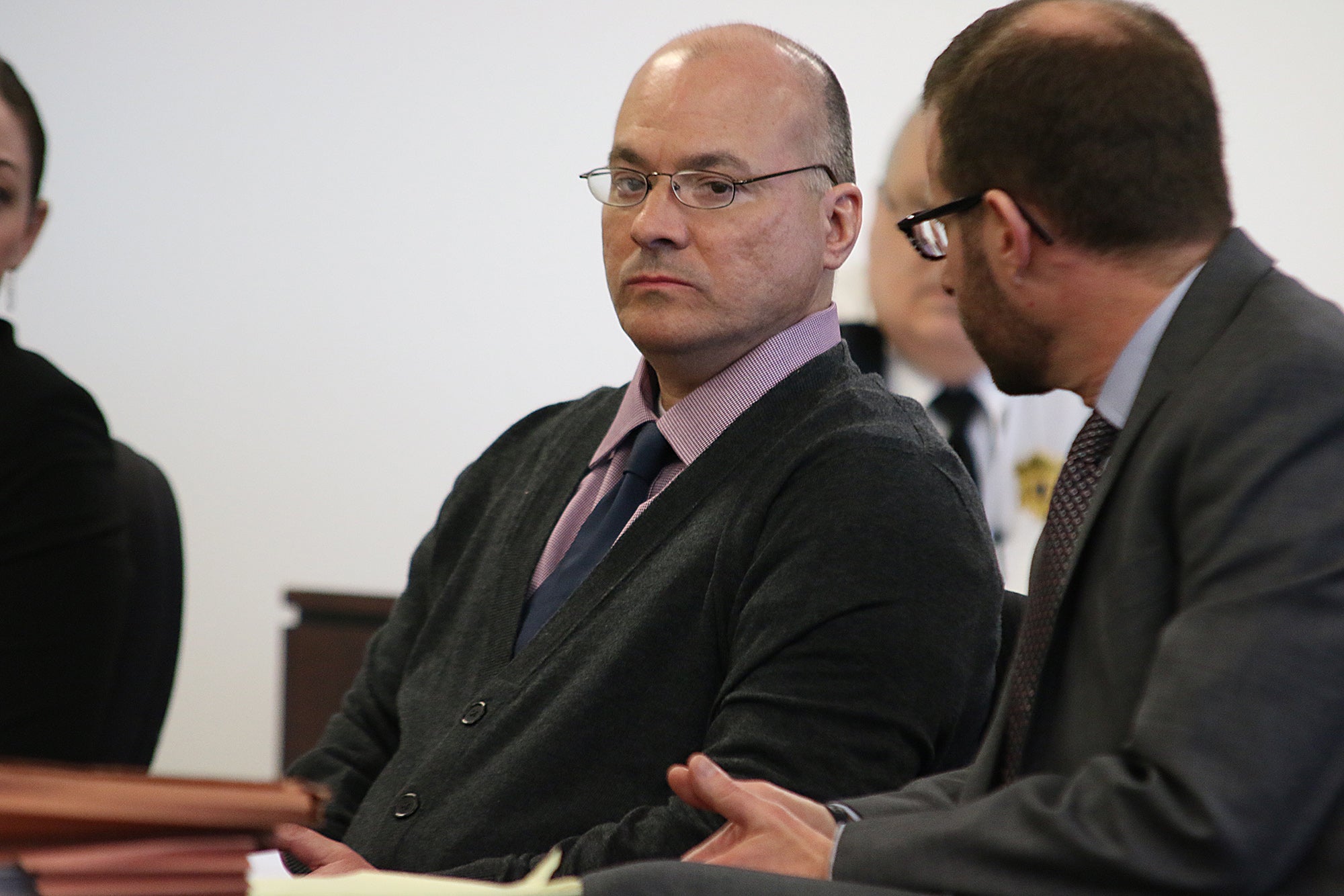 Man convicted of killing 3 denied bid to change sentence