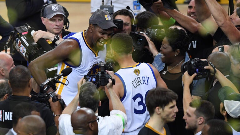 Kevin Durant, Stephen Curry lead Warriors to NBA title