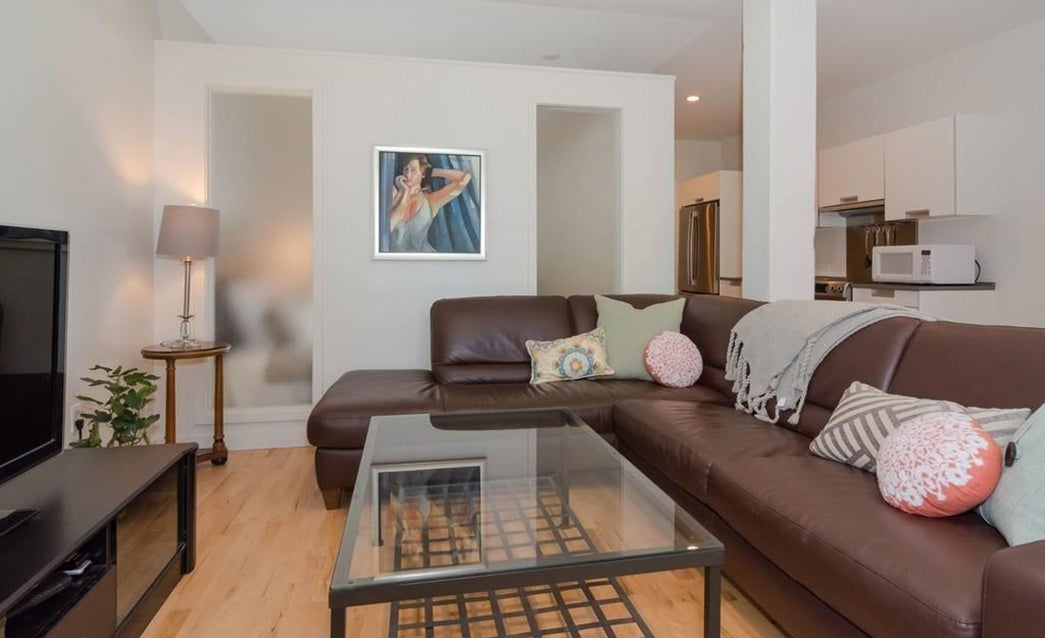 Fort Point condo boasts high ceilings, art gallery in lobby