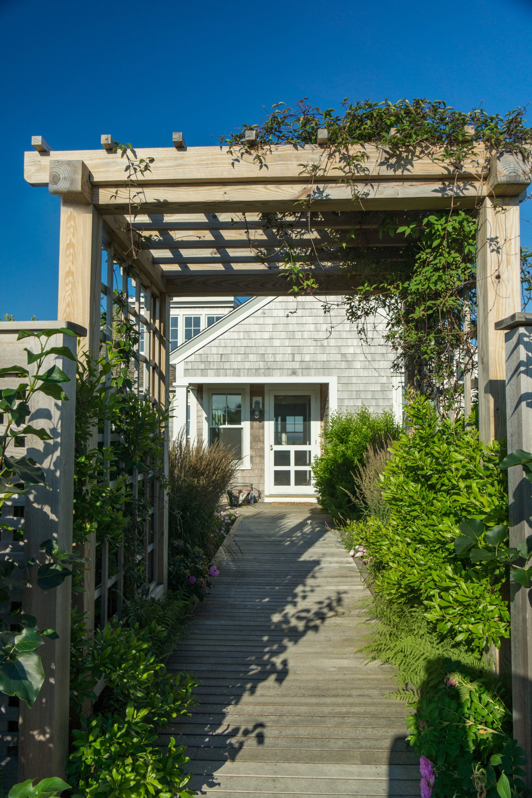 Cluster of cottages proves just right for couple’s vacation home