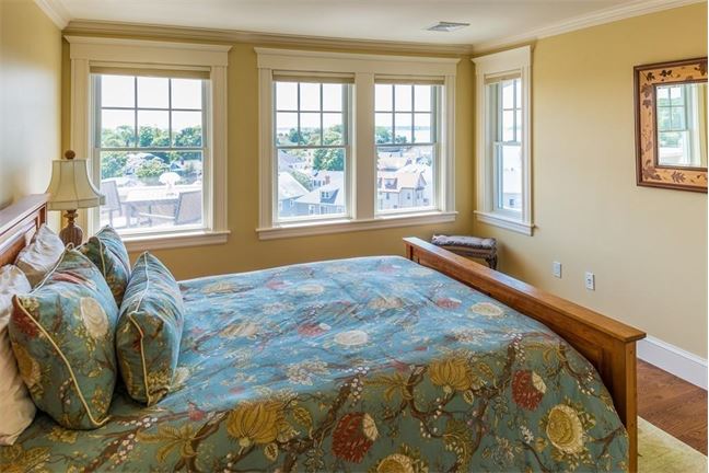 This open Colonial-style home boasts views of Swampscott Harbor