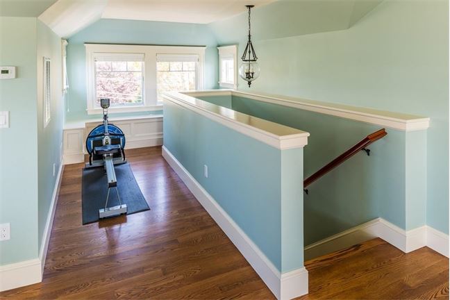 This open Colonial-style home boasts views of Swampscott Harbor