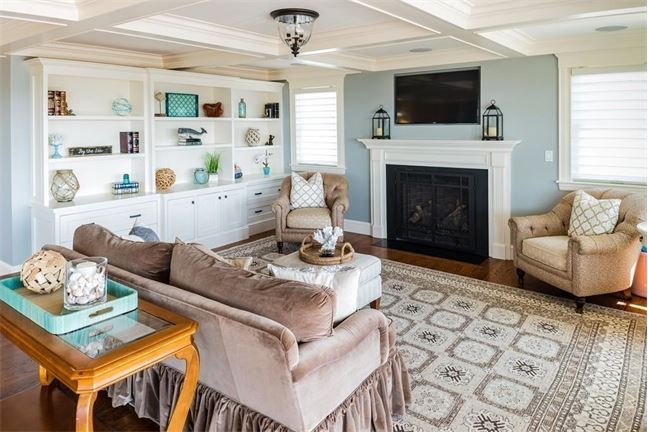 This open Colonial-style home boasts views of Swampscott Harbor