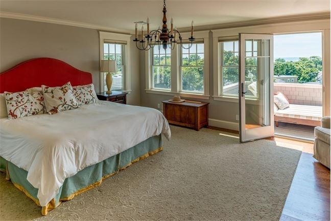 This open Colonial-style home boasts views of Swampscott Harbor