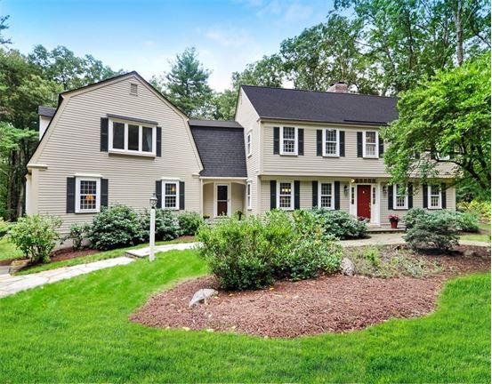 Peek inside this Concord Colonial set on nearly two acres
