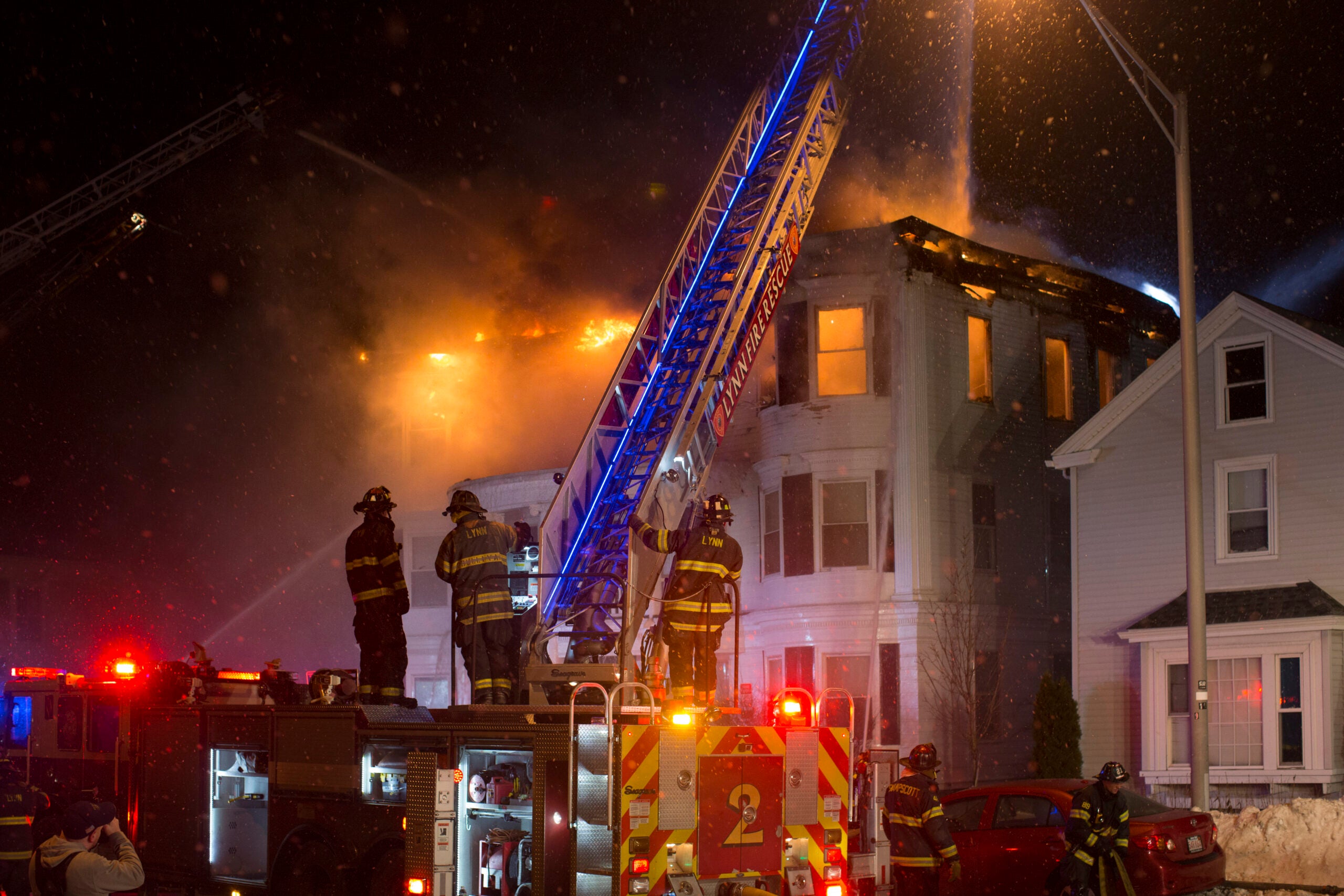Woman injured in raging apartment building fire in Lynn