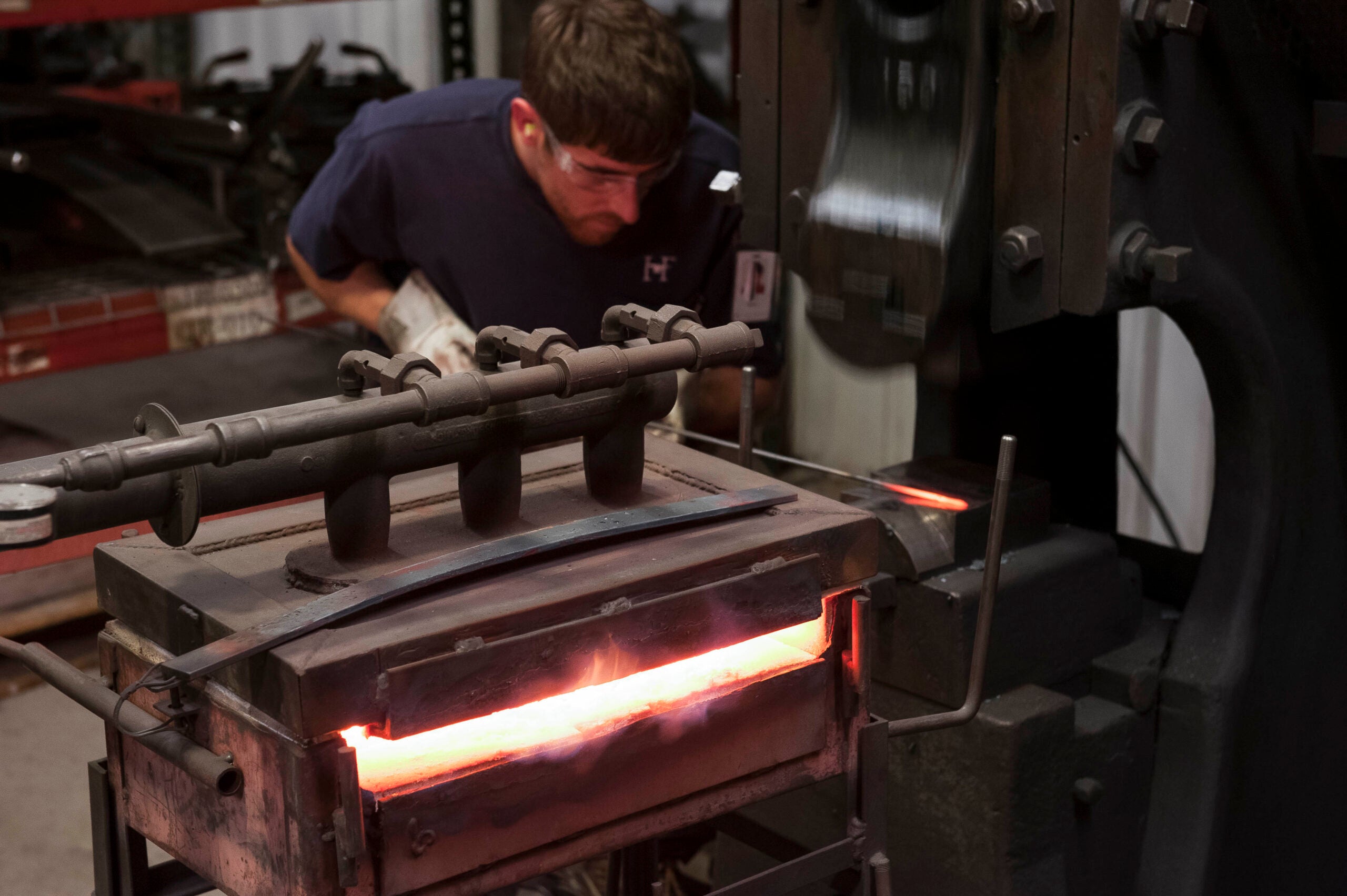 See modern-day blacksmiths create contemporary lighting