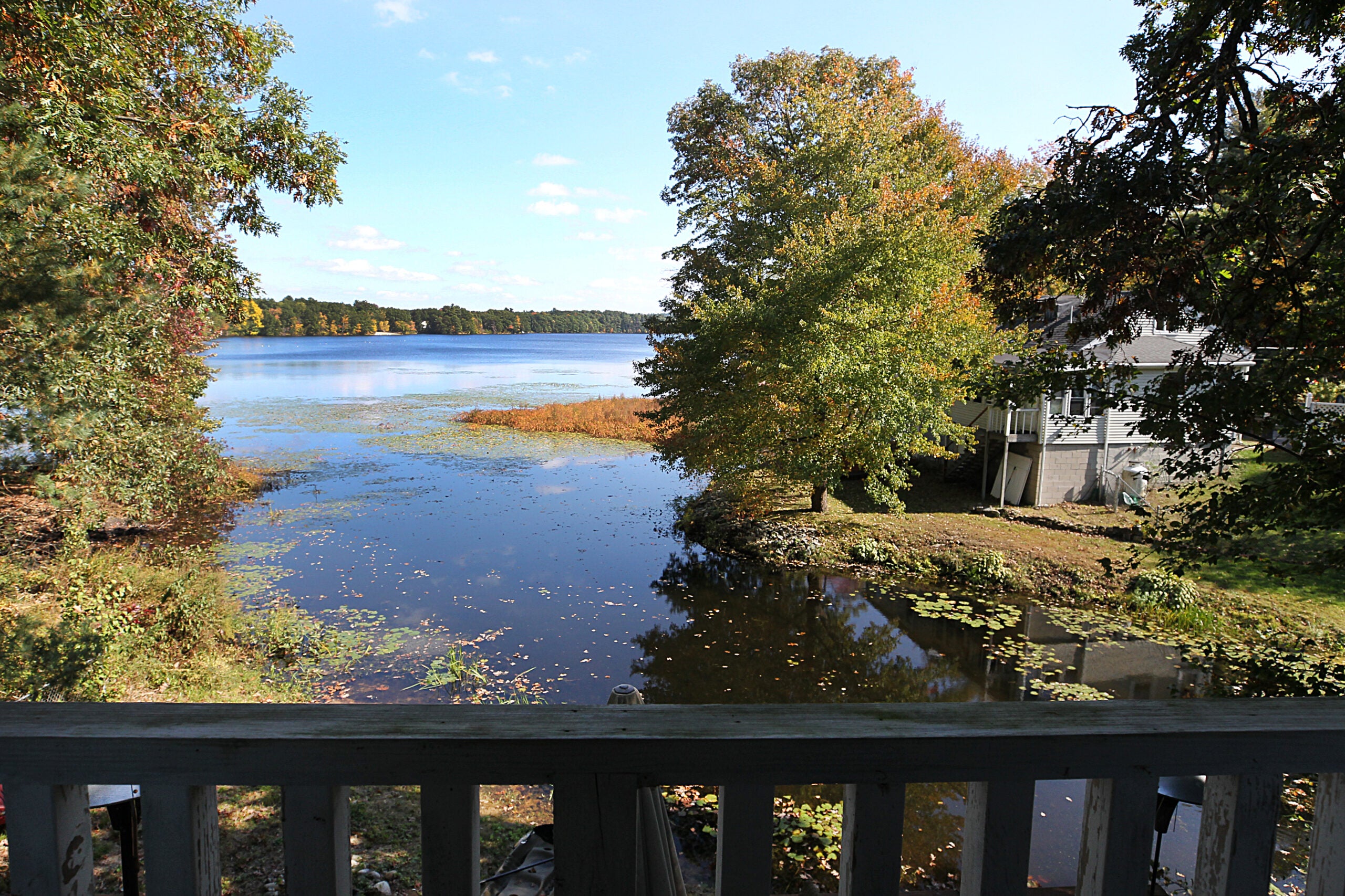 Littleton retreat features bedrooms with decks, and a pond perfect for ...