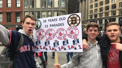 '16 years, 11 parades': 'Sign Kid' was back again for the Red Sox World ...