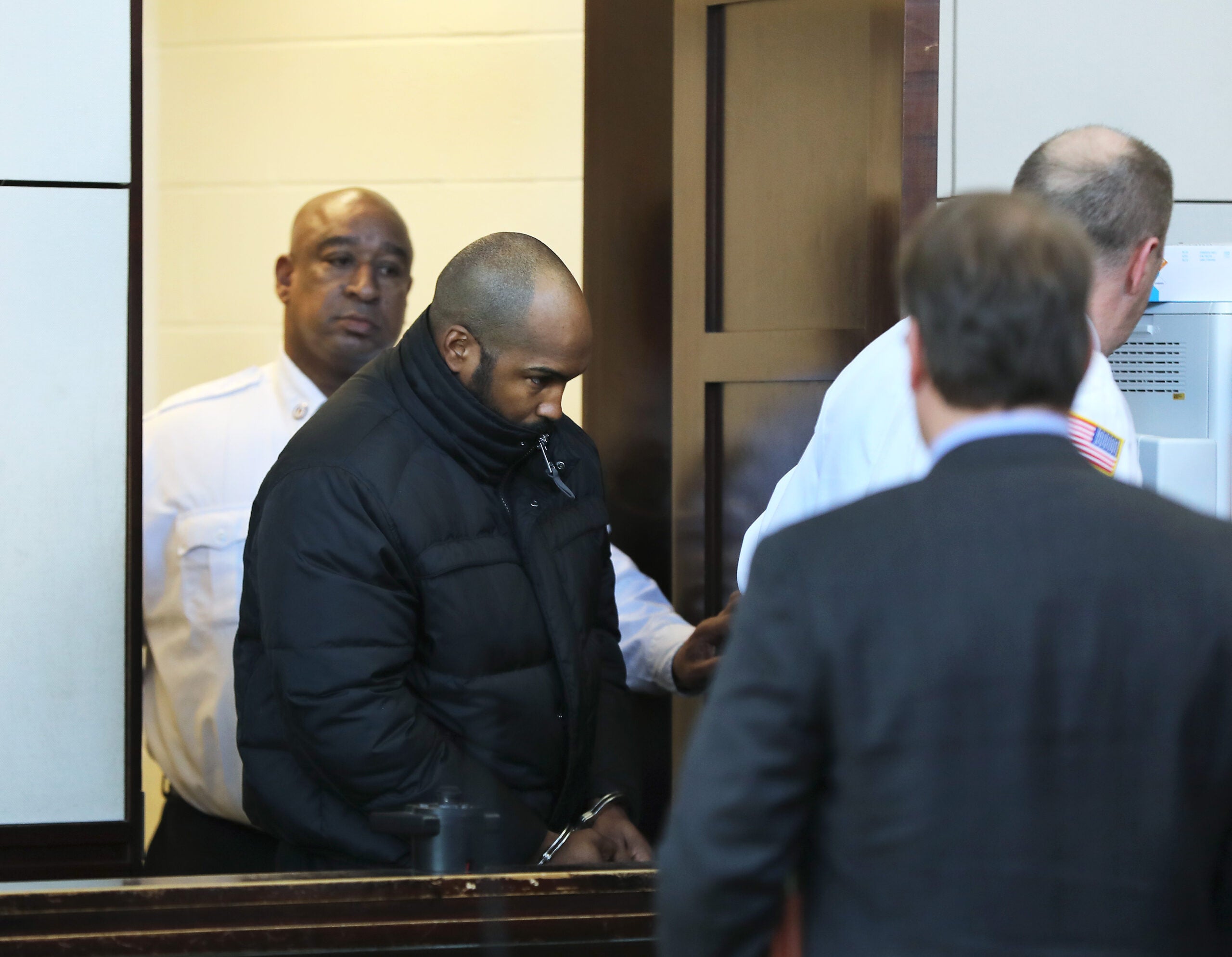 Boston police officer charged in shooting that injured his wife