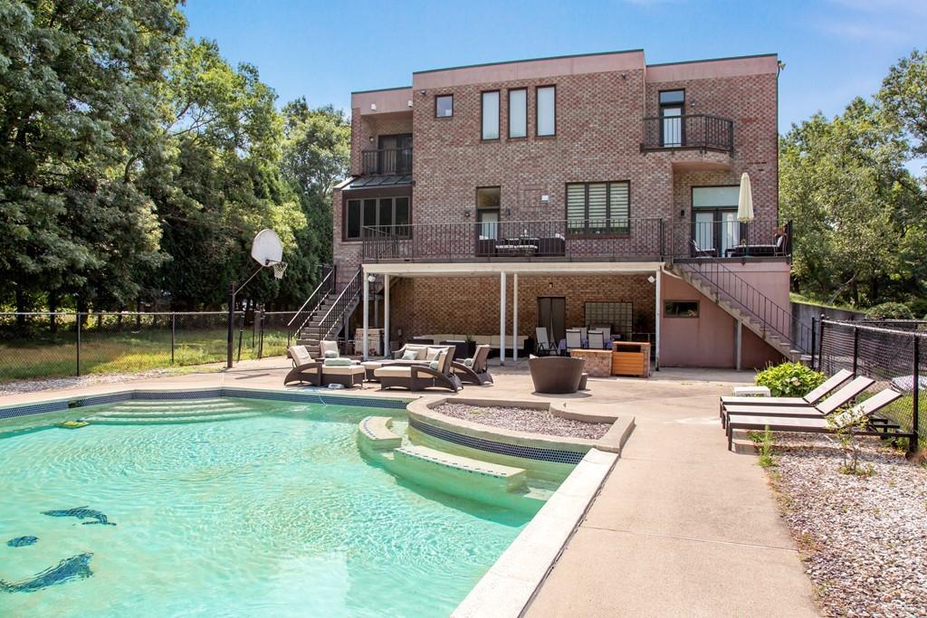 For $1.3 million, Sharon home with glass block, stucco, and sauna