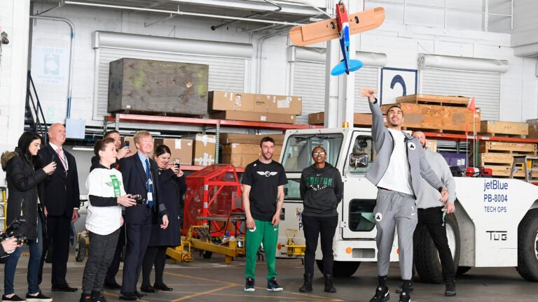 Jayson Tatum flies planes with STEM students at Logan Airport
