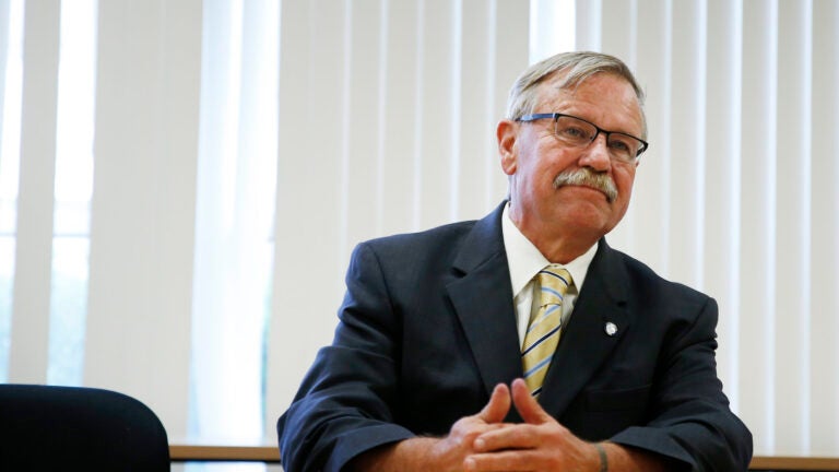 Top Walsh aide to take leave amid bribery investigation