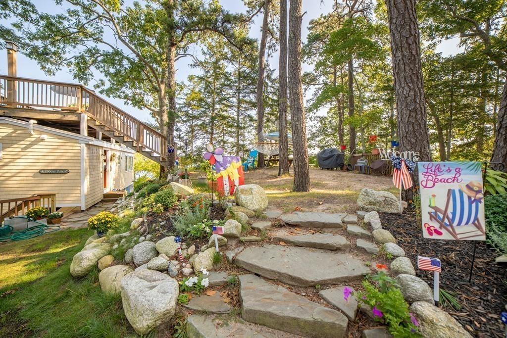 Just listed: Pondside Plymouth 3-season cottage with roof deck