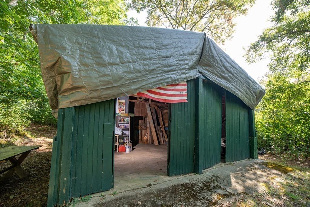 Just listed: Pondside Plymouth 3-season cottage with roof deck