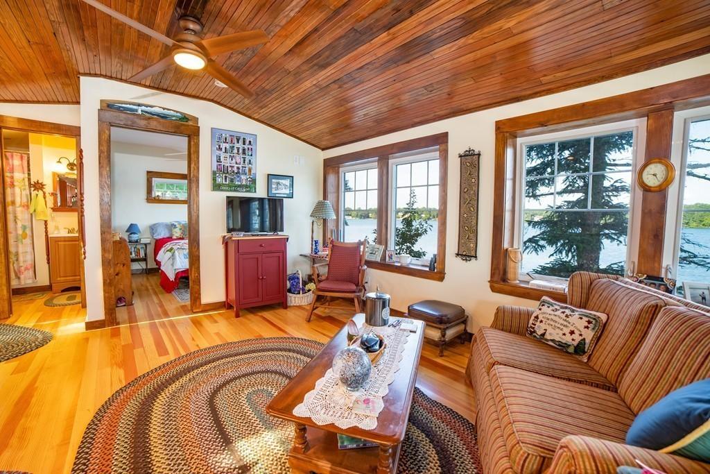 Just listed: Pondside Plymouth 3-season cottage with roof deck