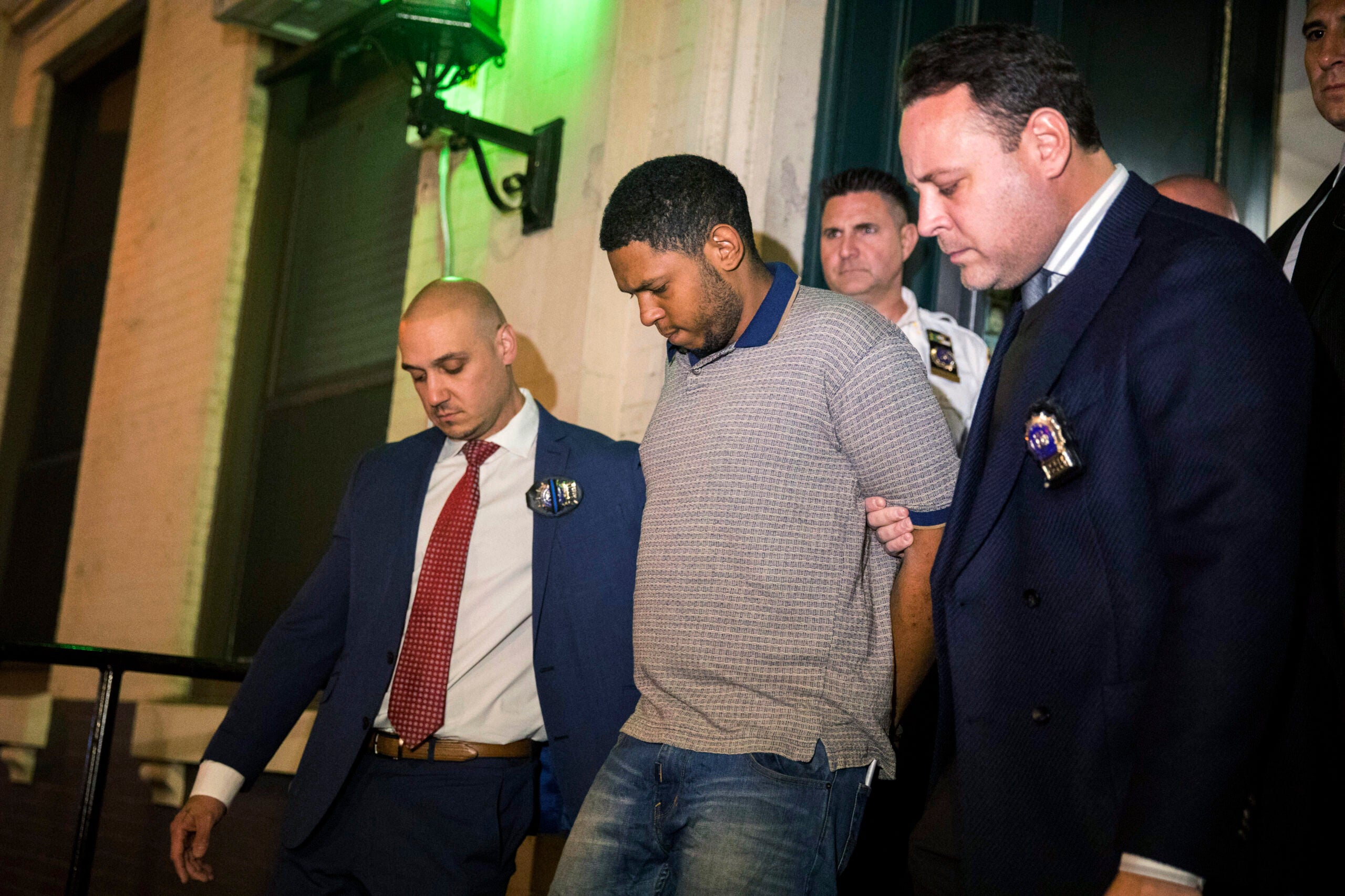 The Latest: Prosecutors: Suspect identified self in video