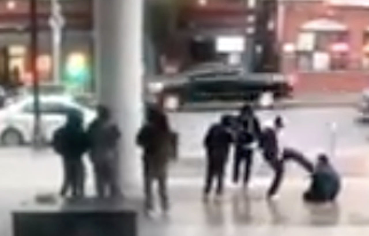 Caught on video: Group of men rip 60-year-old man's cane from his hand ...