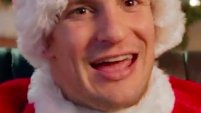 Watch 'Santa Gronk' tell the story of 'How the Grinch won six rings'