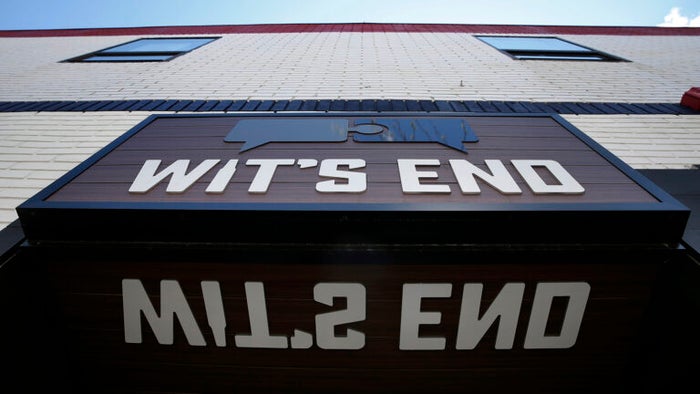 Wit's End, a neighborhood bar serving cocktails and games, has closed