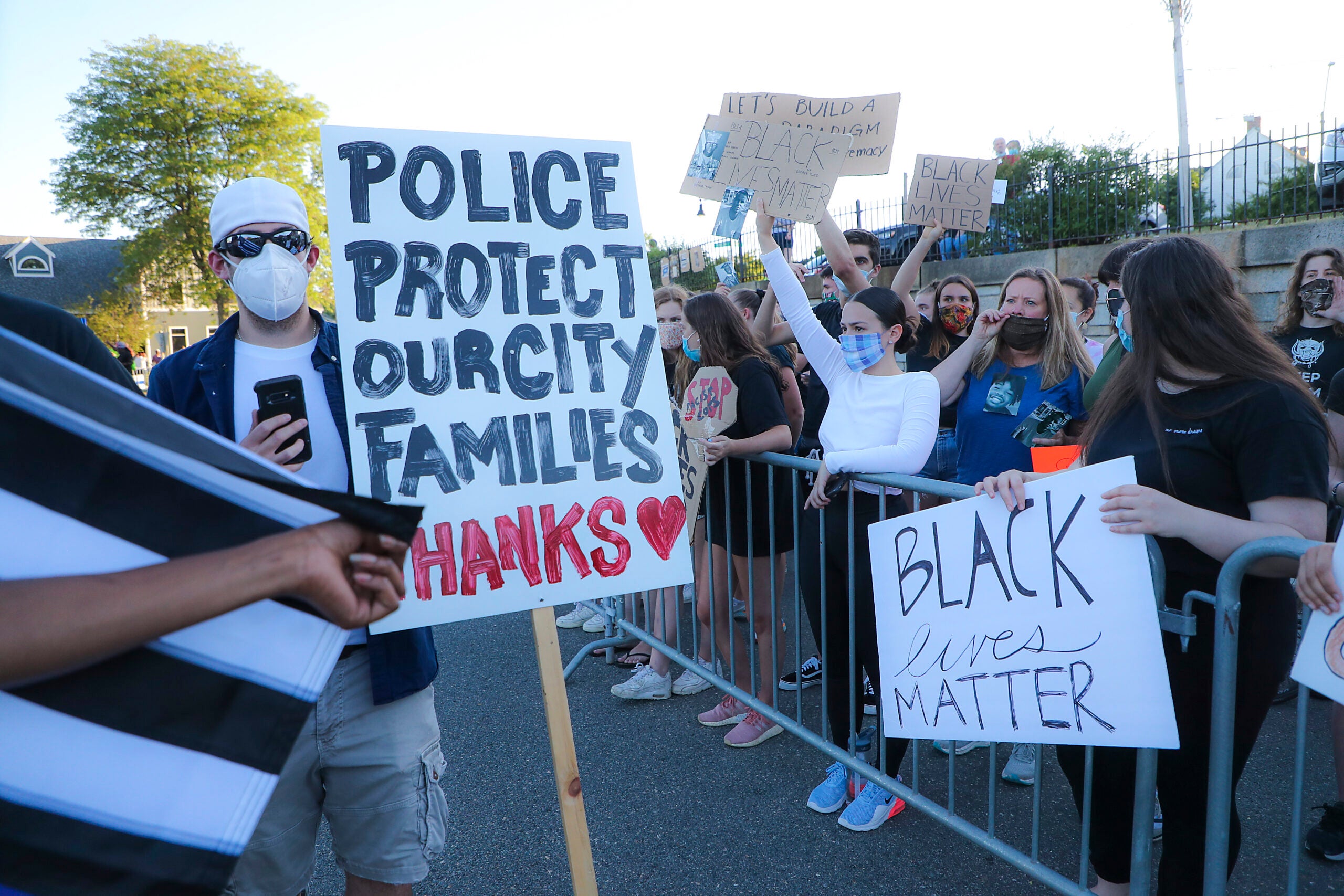 Photos: Separate protests converge in West Roxbury