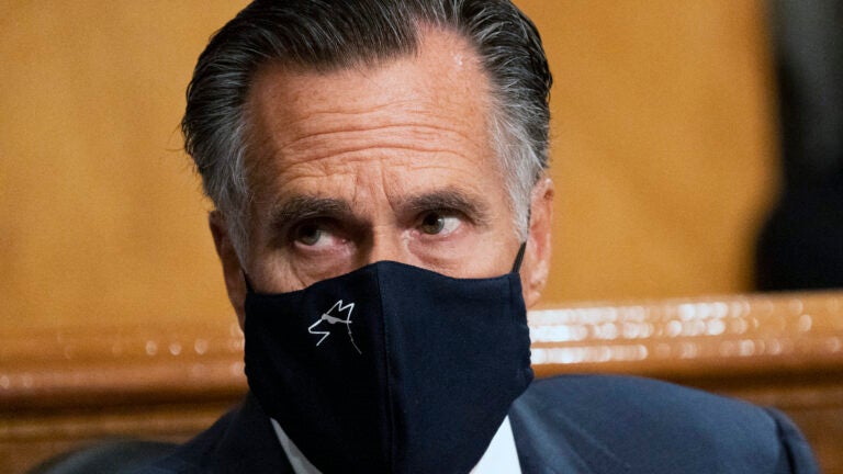 Mitt Romney says he didn't vote for Trump