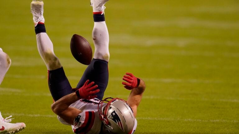 Tony Romo defended Julian Edelman after his costly drop led to a pick-six