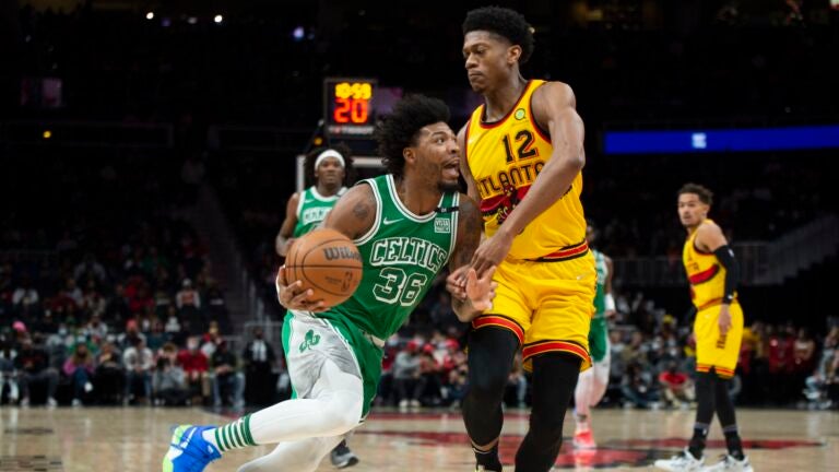 Marcus Smart said he still has glass in his hand from picture frame ...