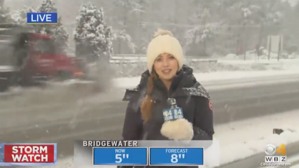 Boston reporter gets hit by a snowplow's wave of slush
