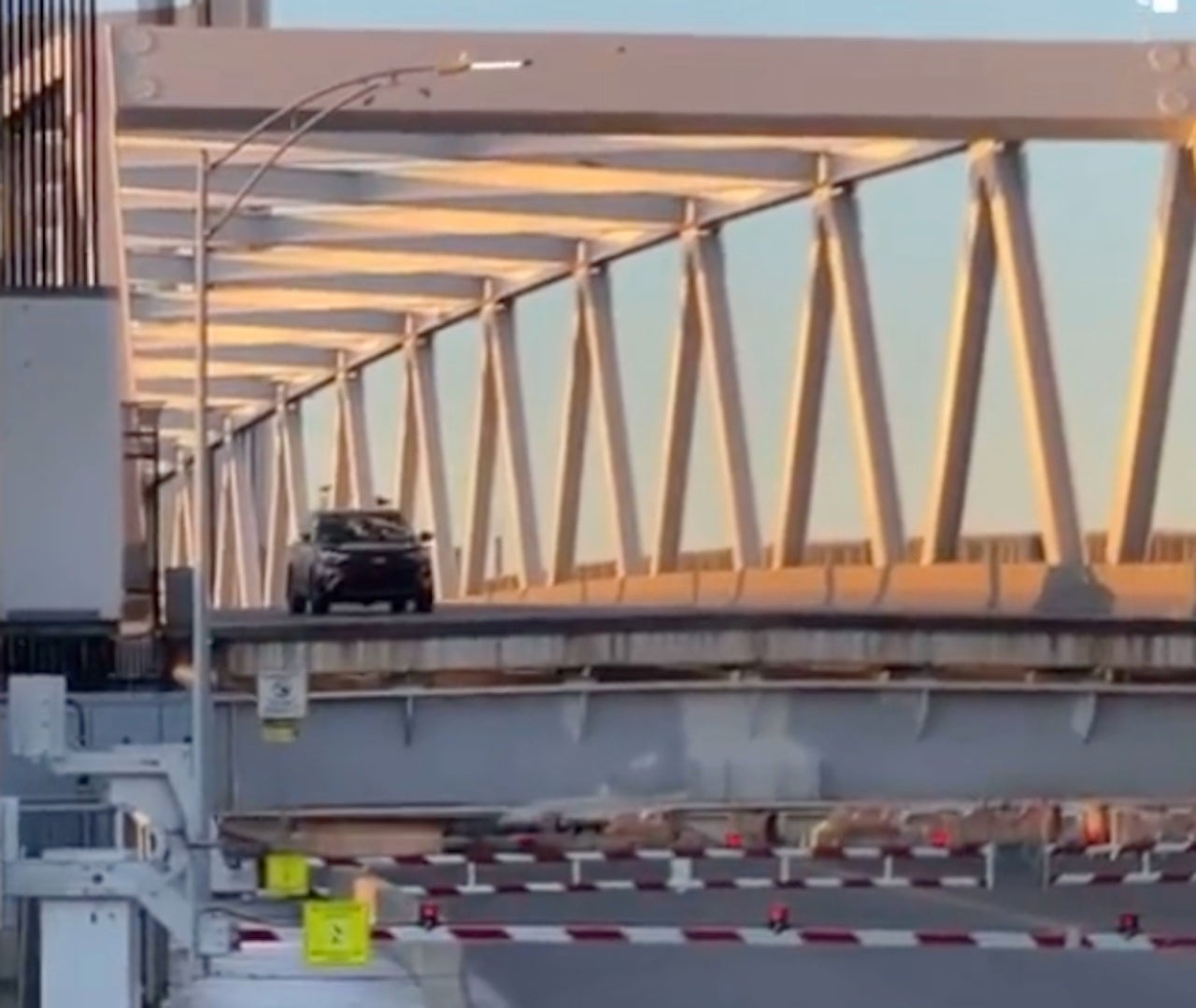 Chelsea St. drawbridge opens with vehicle on it