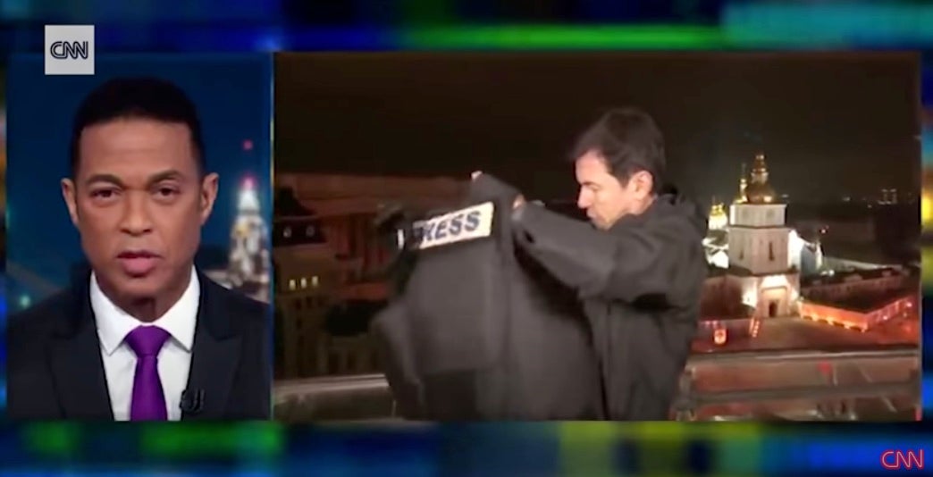 Video: CNN reporter puts on flak jacket, helmet after explosions in Ukraine