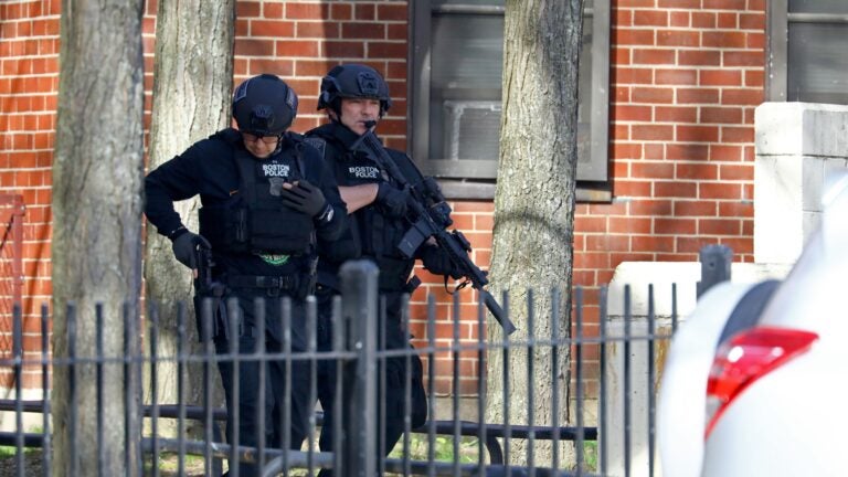 Man taken into police custody after 7 hours barricaded in apartment