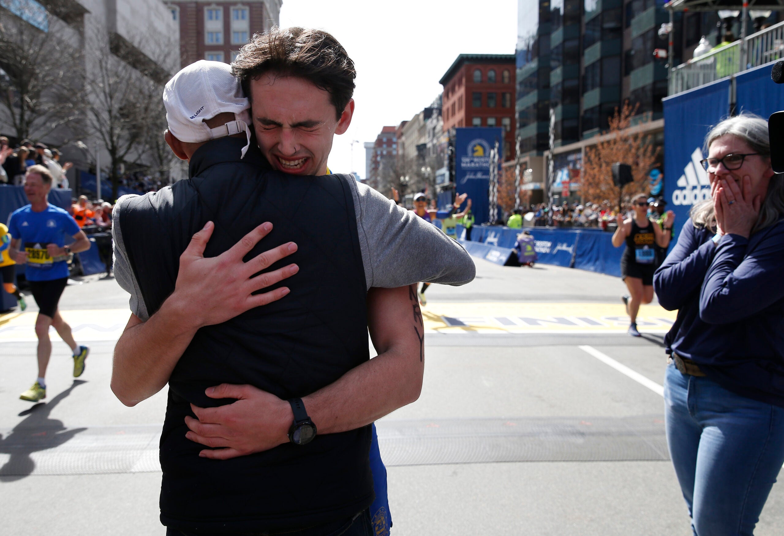 26 photos of absolutely triumphant Boston Marathon finishes