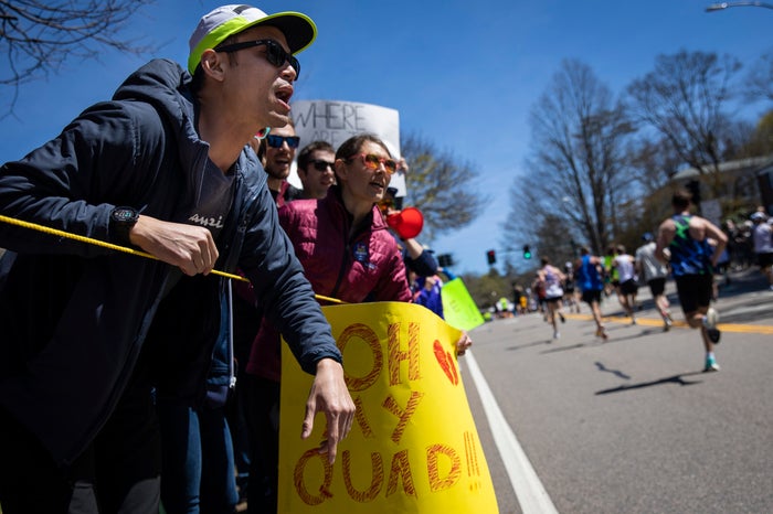 12 of the best signs spotted along the 2022 Boston Marathon route