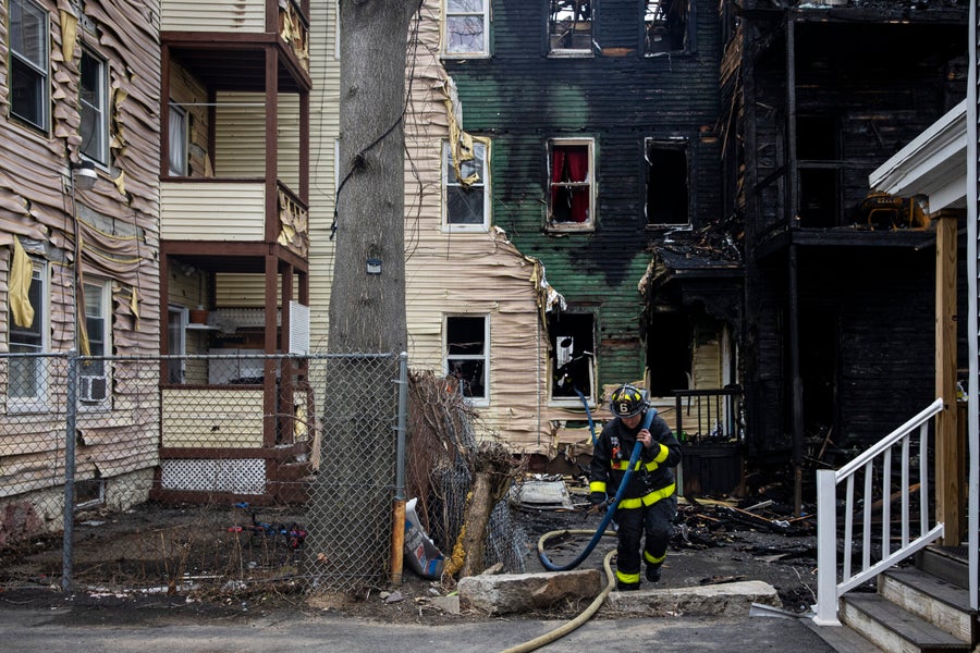 6 alarm fire in Lawrence rages through several homes