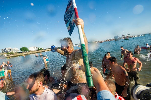 Watch: Gloucester's greasy pole contest looks as painful as ever
